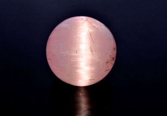 Pink cat’s-eye quartz, with colour and chatoyancy caused by tourmaline ...